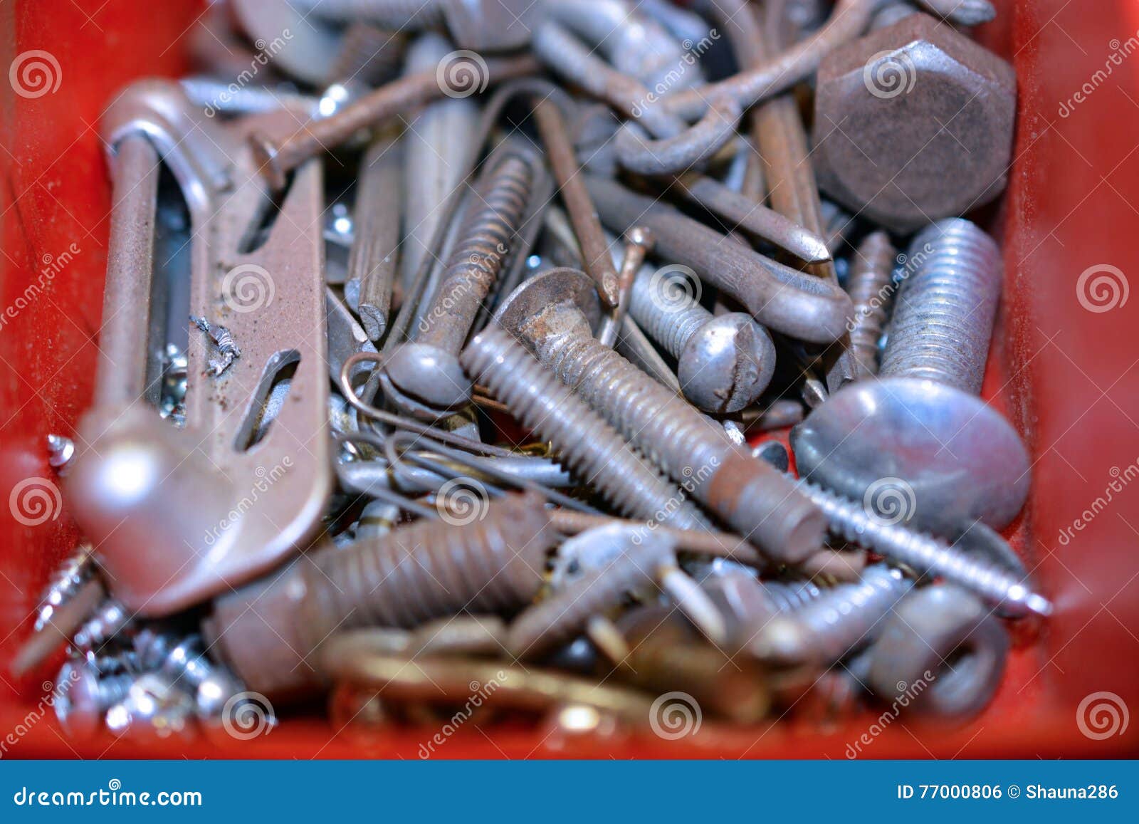 Screws, Nuts, Bolts and Nails in a Container Stock Photo - Image of ...