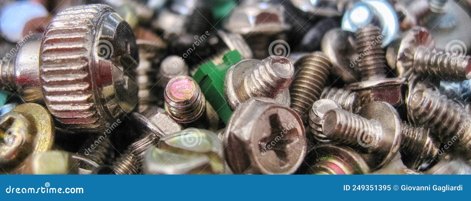 Screws and Nuts on a Bucket Stock Image - Image of isolated, iron ...