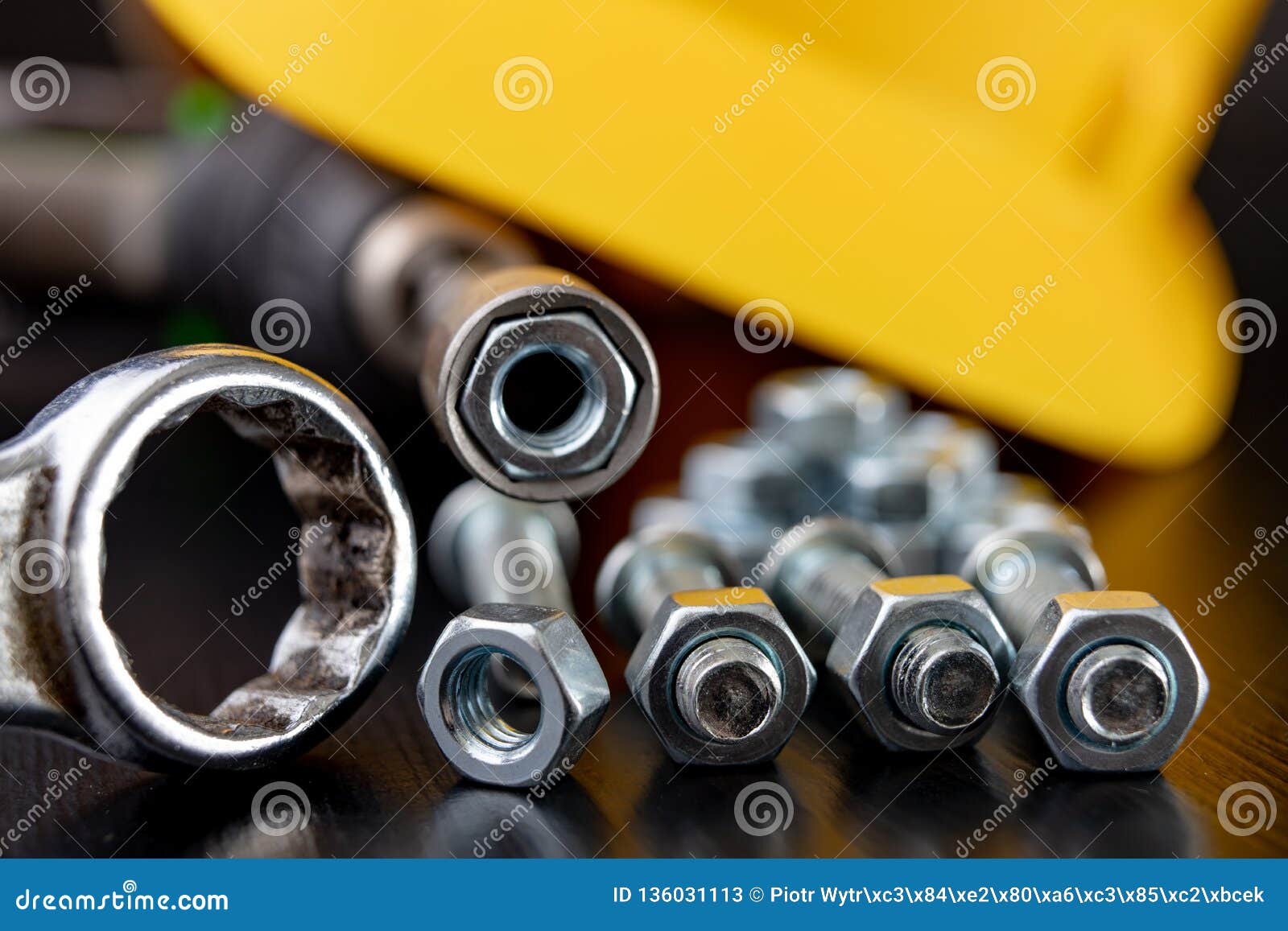 Screws, Nuts and Keys on a Workshop Table. Tools and Accessories for ...