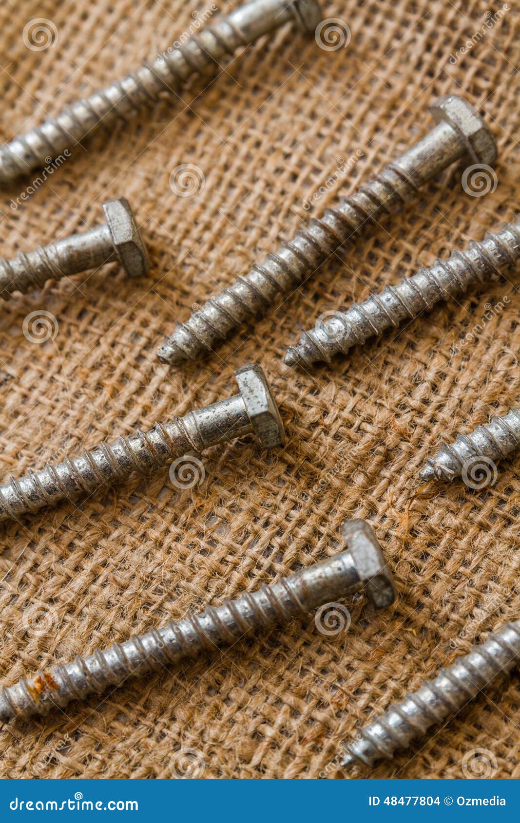 Screws on Sack Fabric stock photo. Image of construction - 48477804