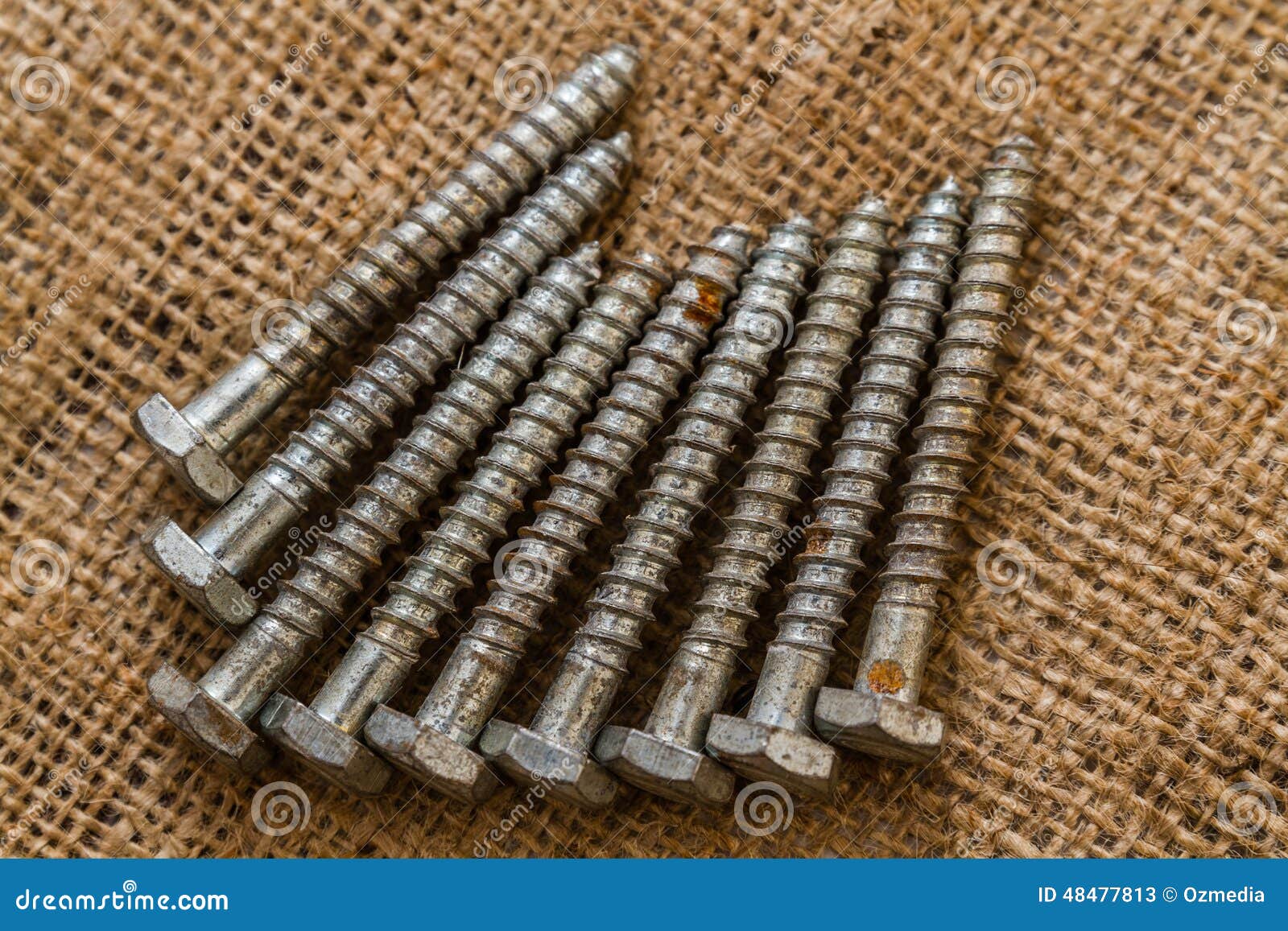 Screws on Sack Fabric stock image. Image of grey, black - 48477813