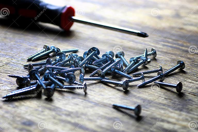 Screws and Screwdriver Stack Stock Image - Image of metal, industry ...