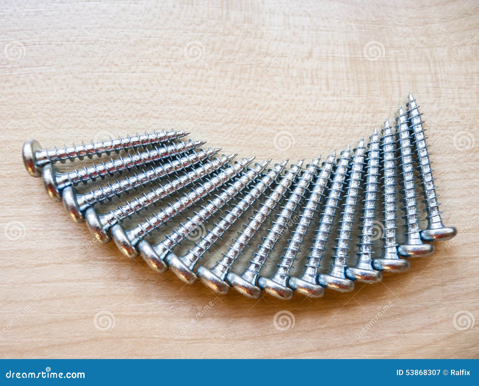 Screws on the table stock image. Image of material, detail - 53868307