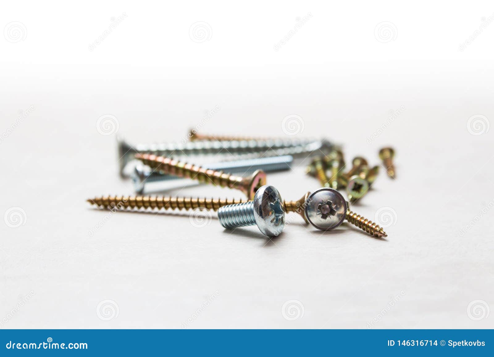 Screws on white background stock photo. Image of bunch - 146316714