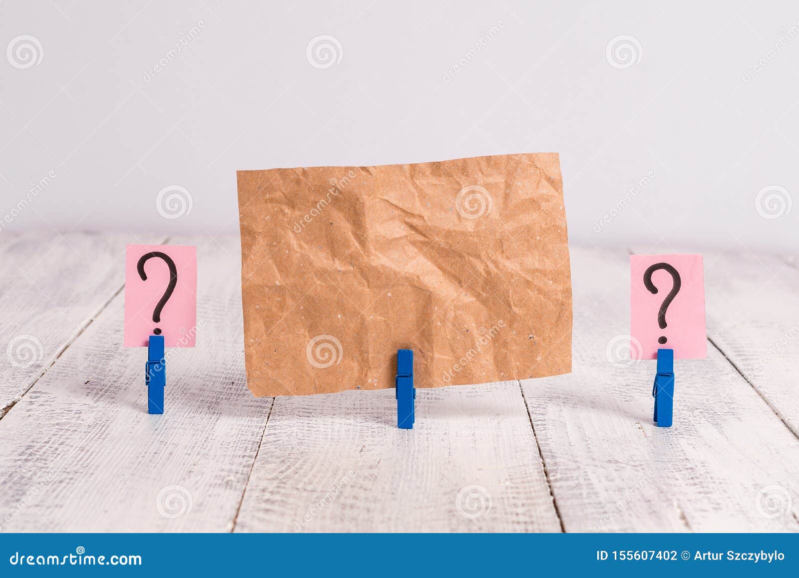 Scribbled and Crumbling Papers with Paper Clips Placed on the Wooden ...