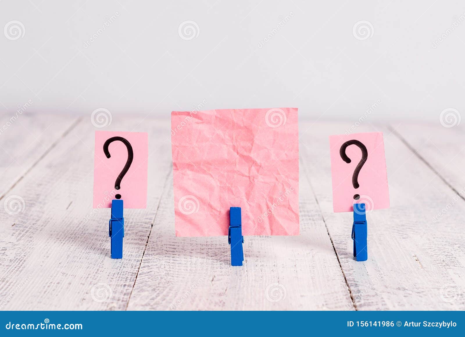 Scribbled and Crumbling Papers with Paper Clips Placed on the Wooden ...