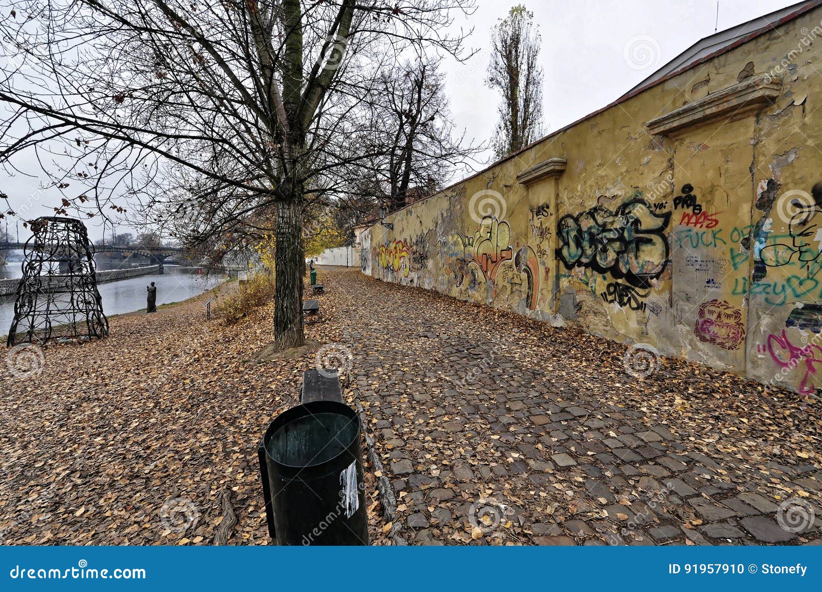 Scribbled Wall and Trash in the Path Stock Photo - Image of damage ...