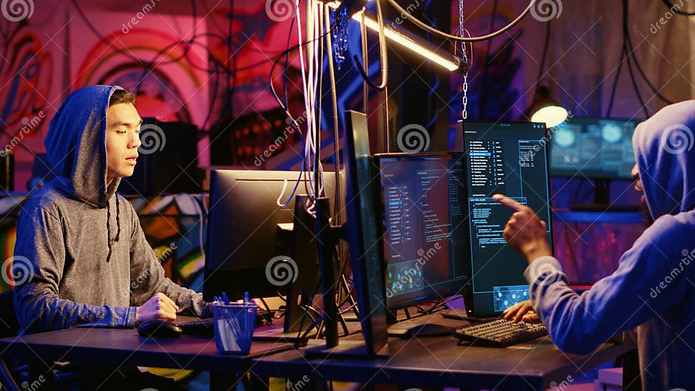 Script Kiddie Helped by Hacker Stock Photo - Image of fraud, data ...