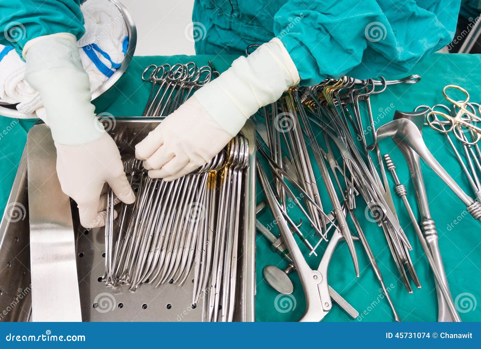 Scrub Nurse Preparing Instruments for Operation Stock Photo - Image of ...