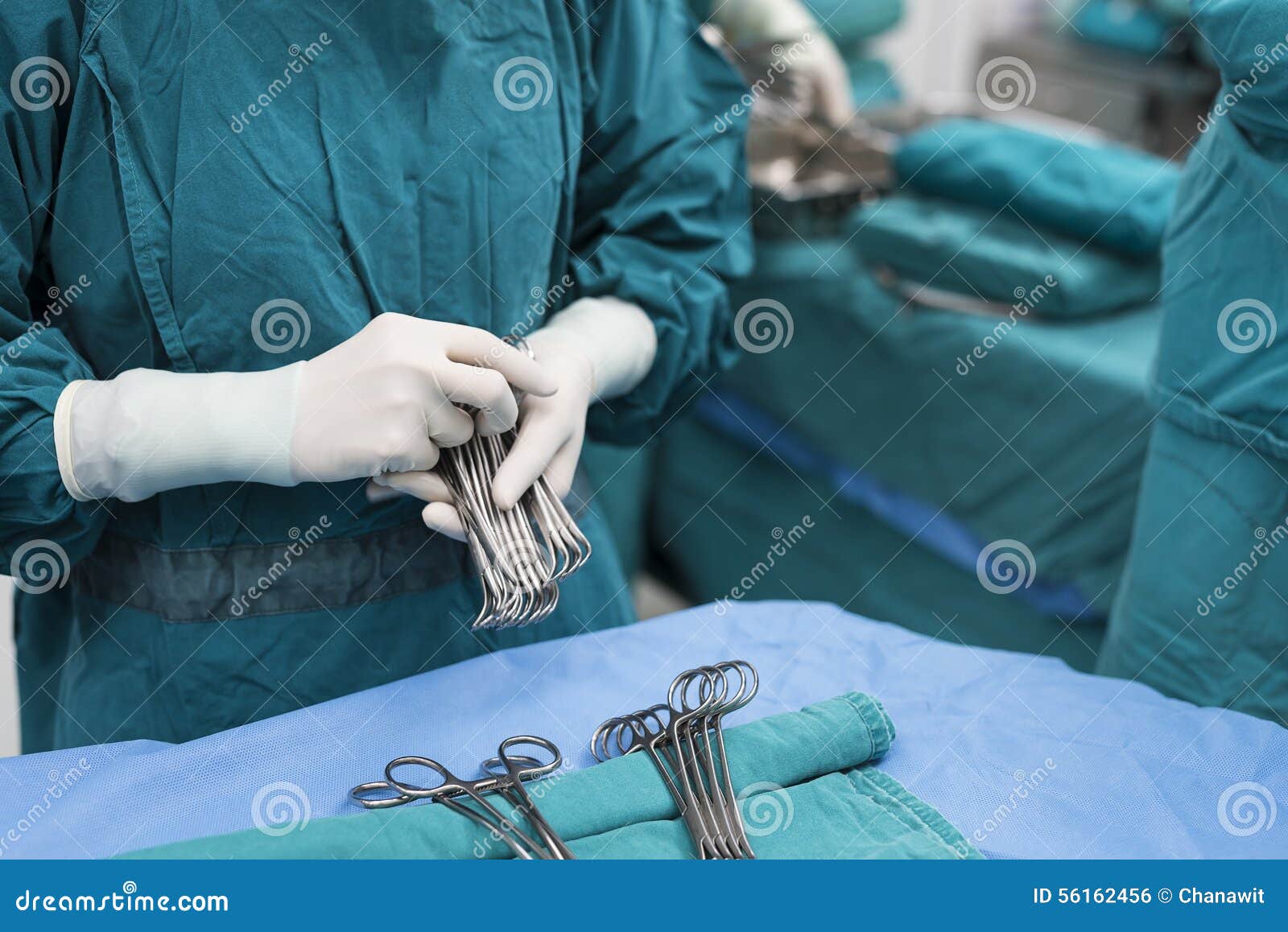 Scrub Nurse Preparing Medical Instruments for Operation Stock Photo ...