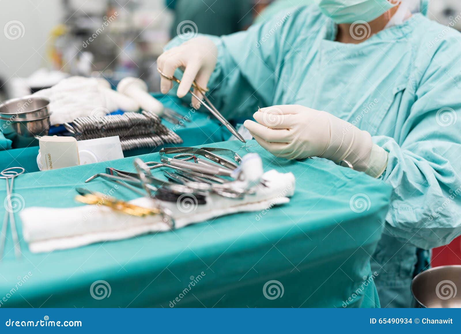 Scrub Nurse Preparing Medical Instruments for Operation Stock Photo ...