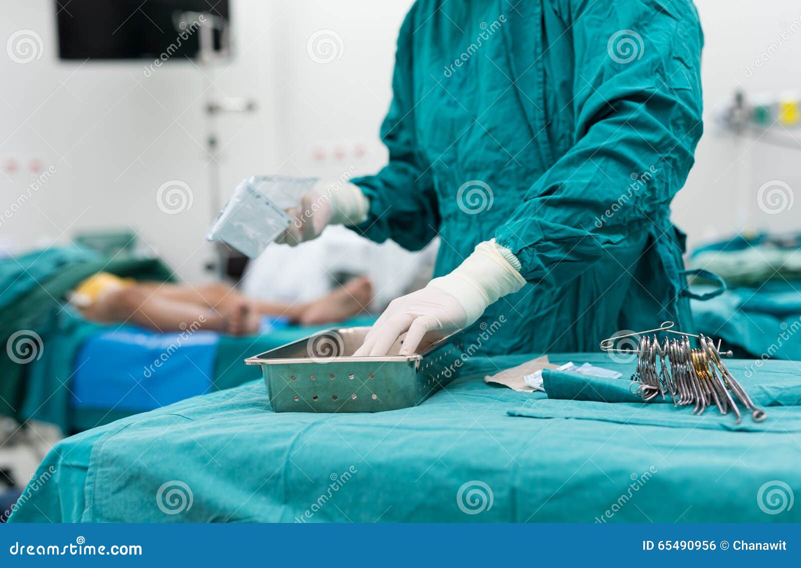 Scrub Nurse Preparing Medical Instruments for Operation Stock Photo ...
