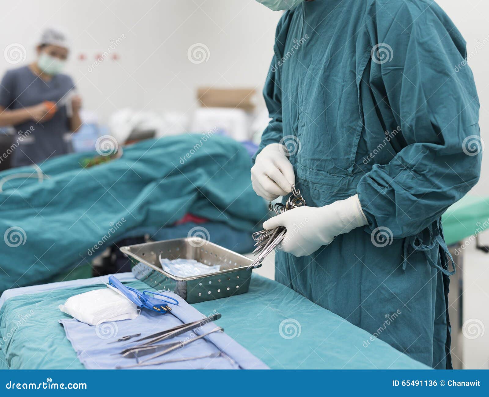 Scrub Nurse Preparing Medical Instruments for Operation Stock Photo ...