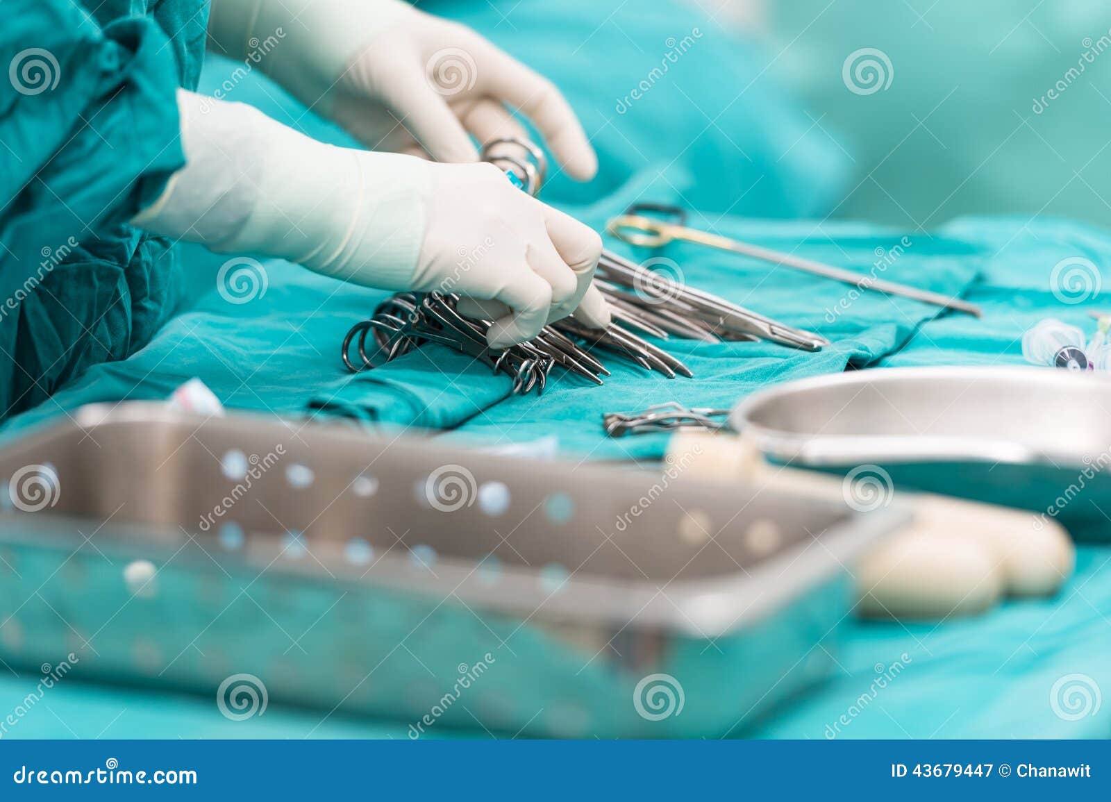 Scrub Nurse Preparing Tools for Operation Stock Image - Image of clamp ...