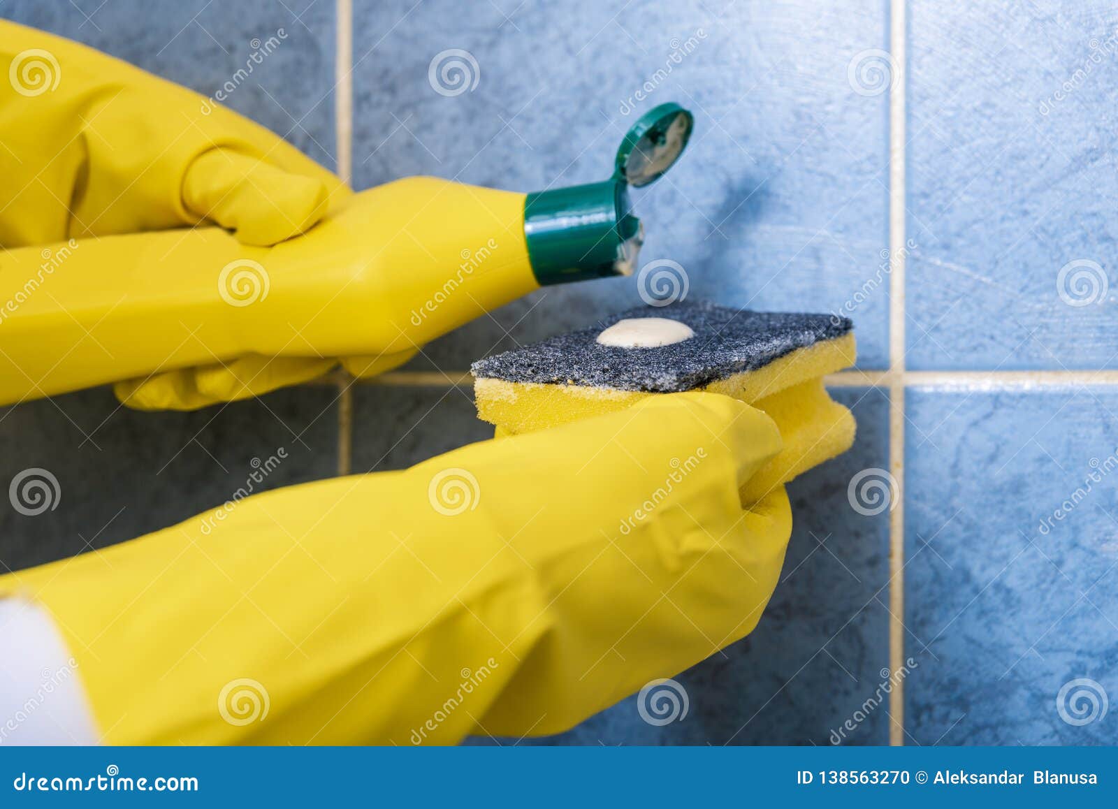 Scrubbing the Tiles in the Kitchen with a Sponge Stock Photo - Image of ...