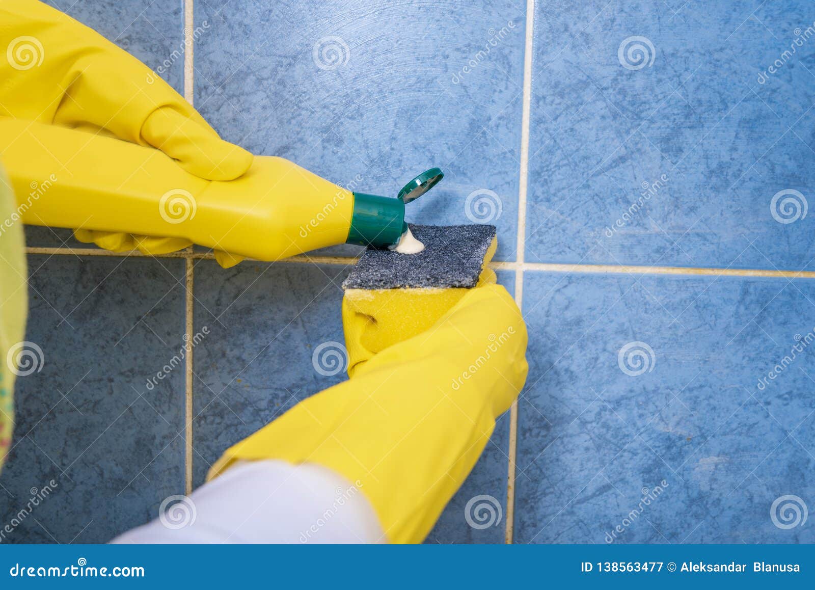 Scrubbing the Tiles in the Kitchen with a Sponge Stock Image - Image of ...