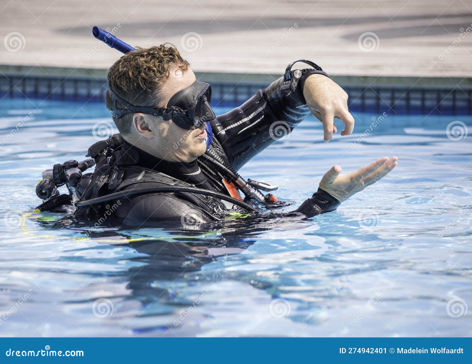 Scuba Dive Instructor Teaching and Explaining To Students Skills in the ...