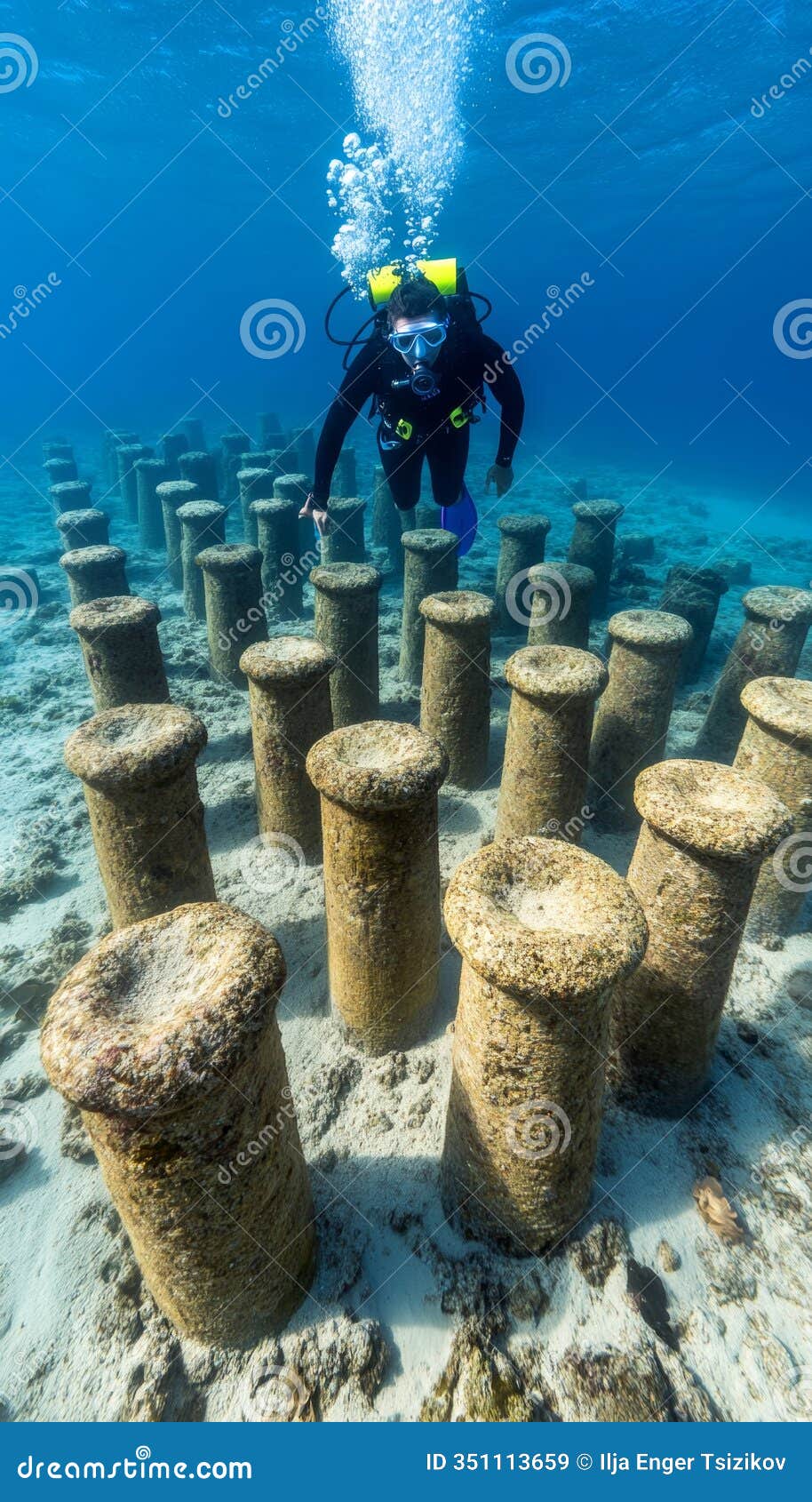 Scuba Diver Explores Underwater Grid of Artificial Reef Structures ...