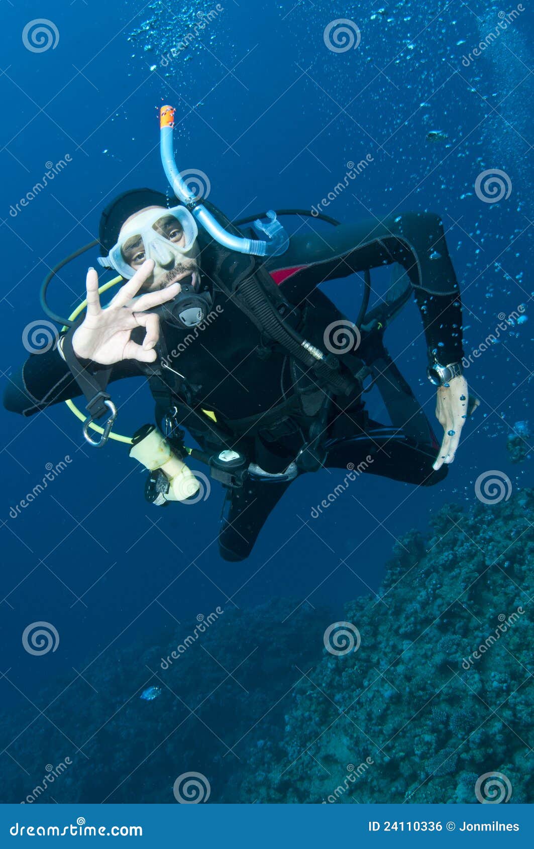 Scuba diver gies OK sign stock photo. Image of depth - 24110336