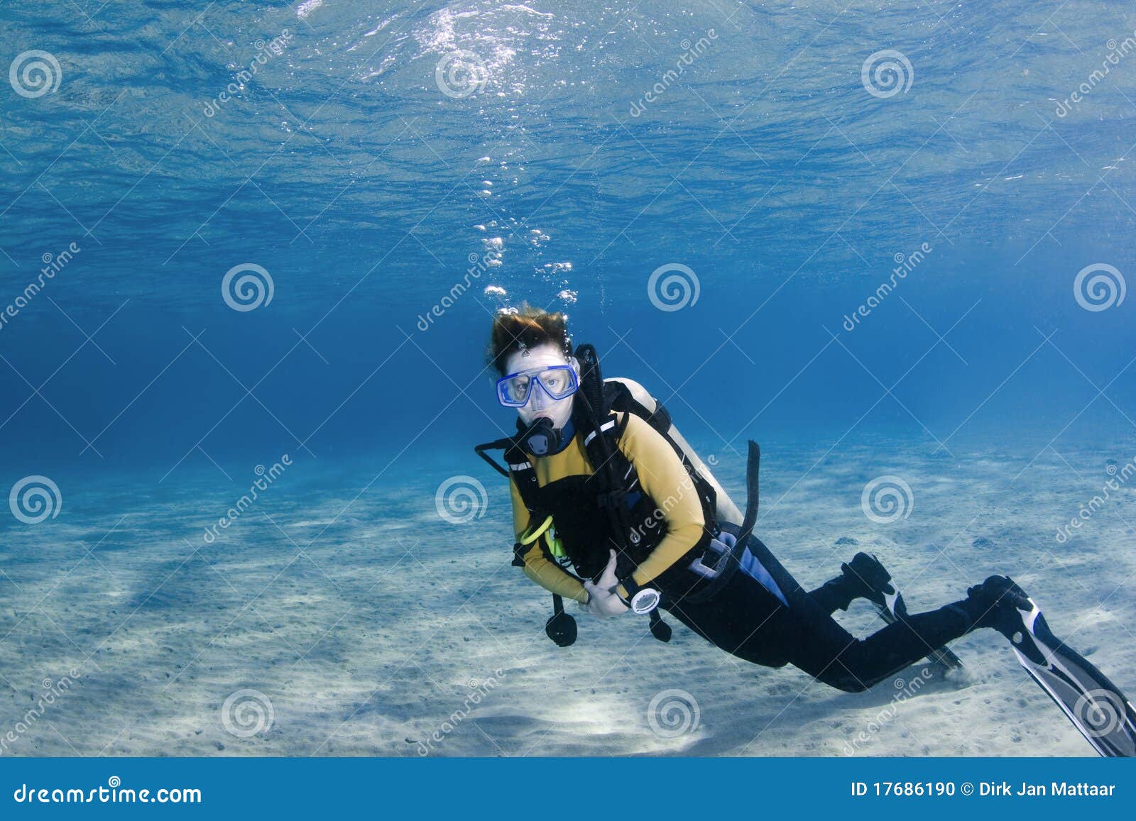 Diver Over Coral Reef With Boat And Sky In Background Royalty-Free ...