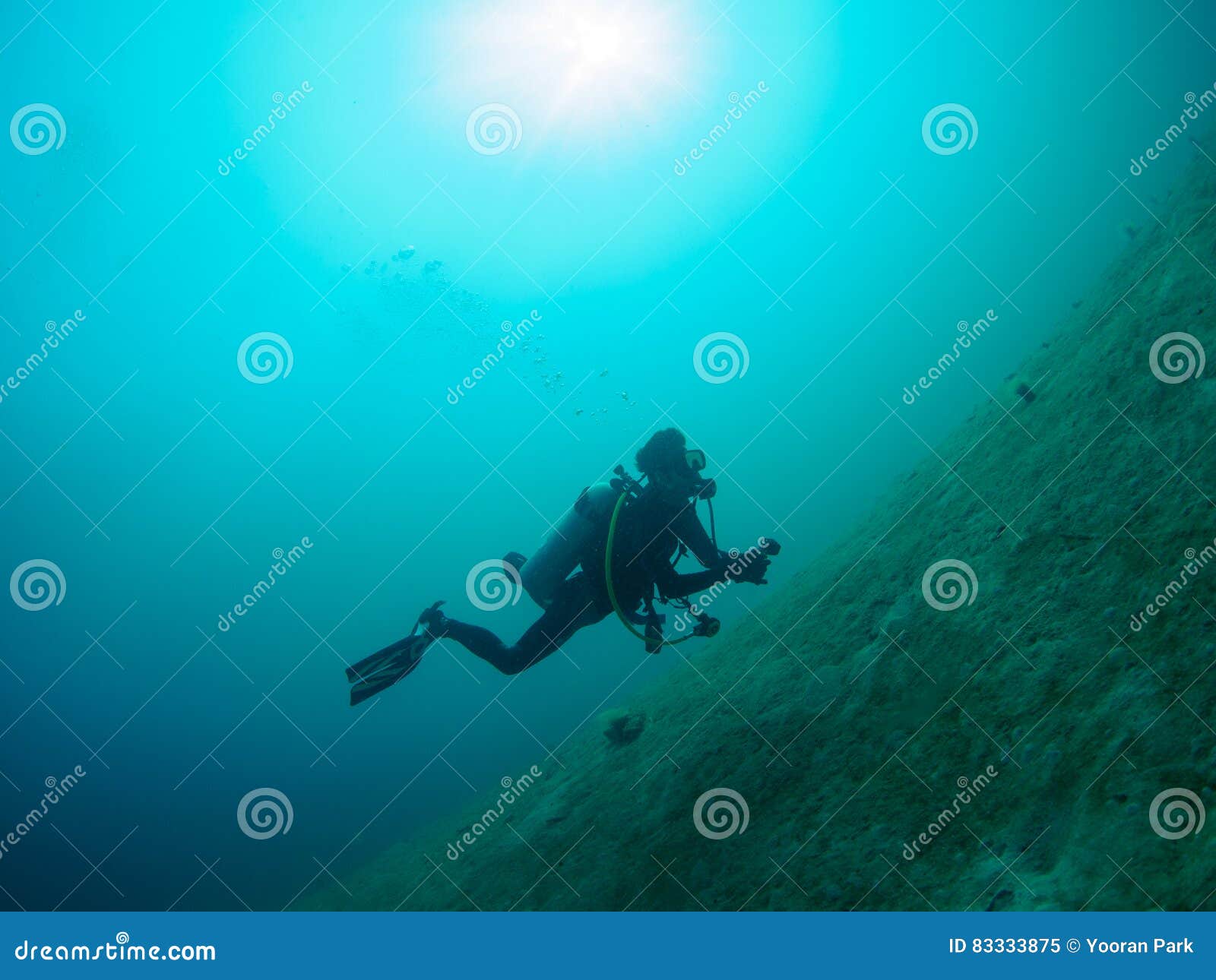 Scuba Diver Passing As Bubble Rising. Stock Image - Image of clear ...