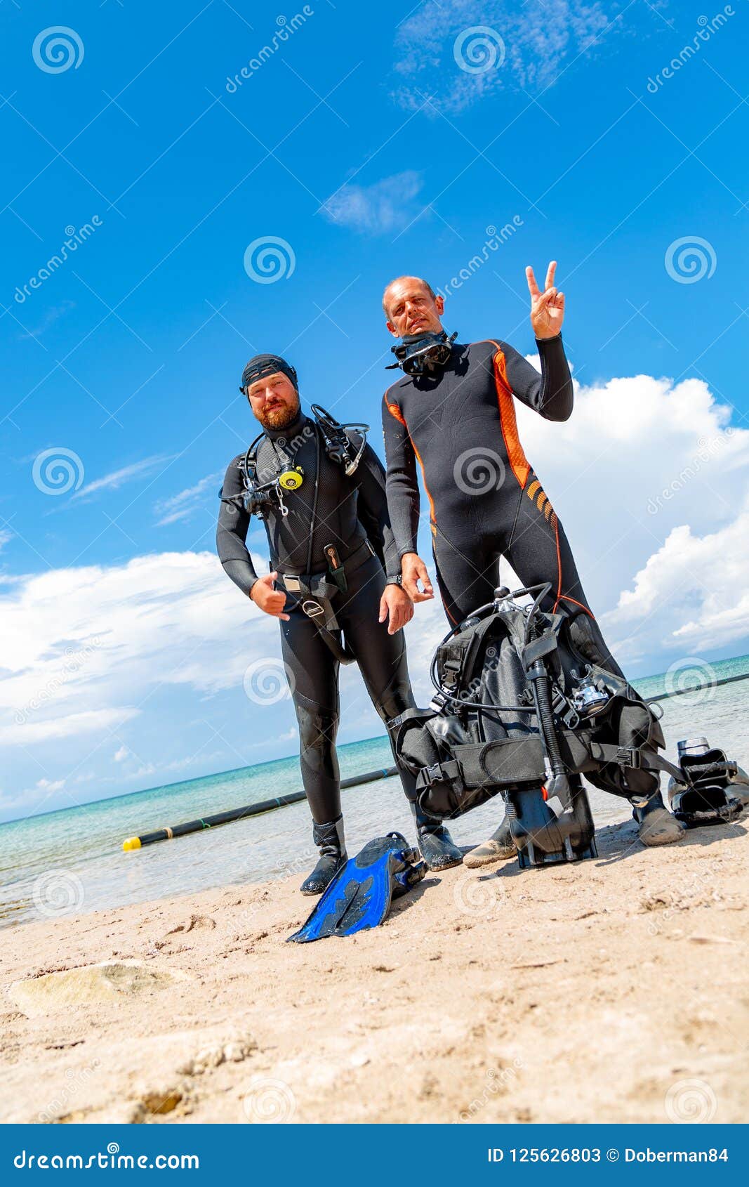Scuba Divers in a Suit for Diving Having Fun Stock Image - Image of ...