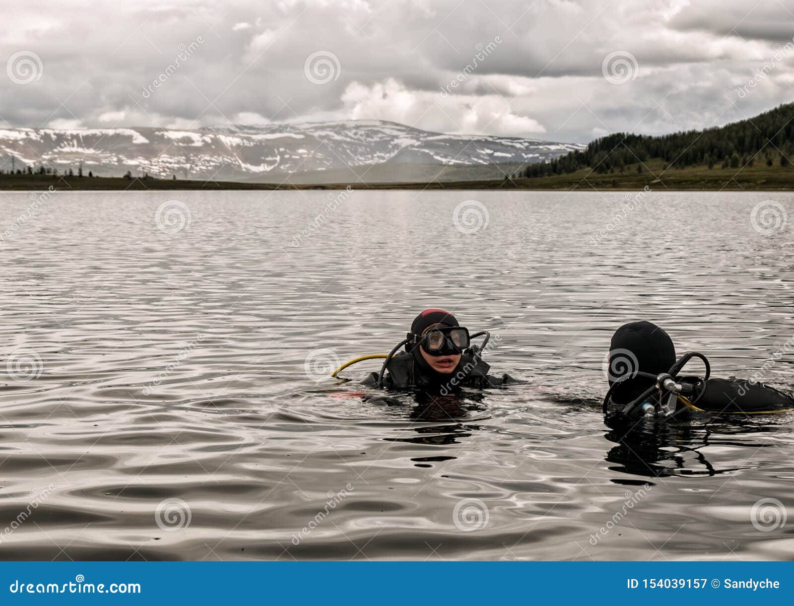 Scuba Diving in a Mountain Lake, Practicing Techniques for Emergency ...