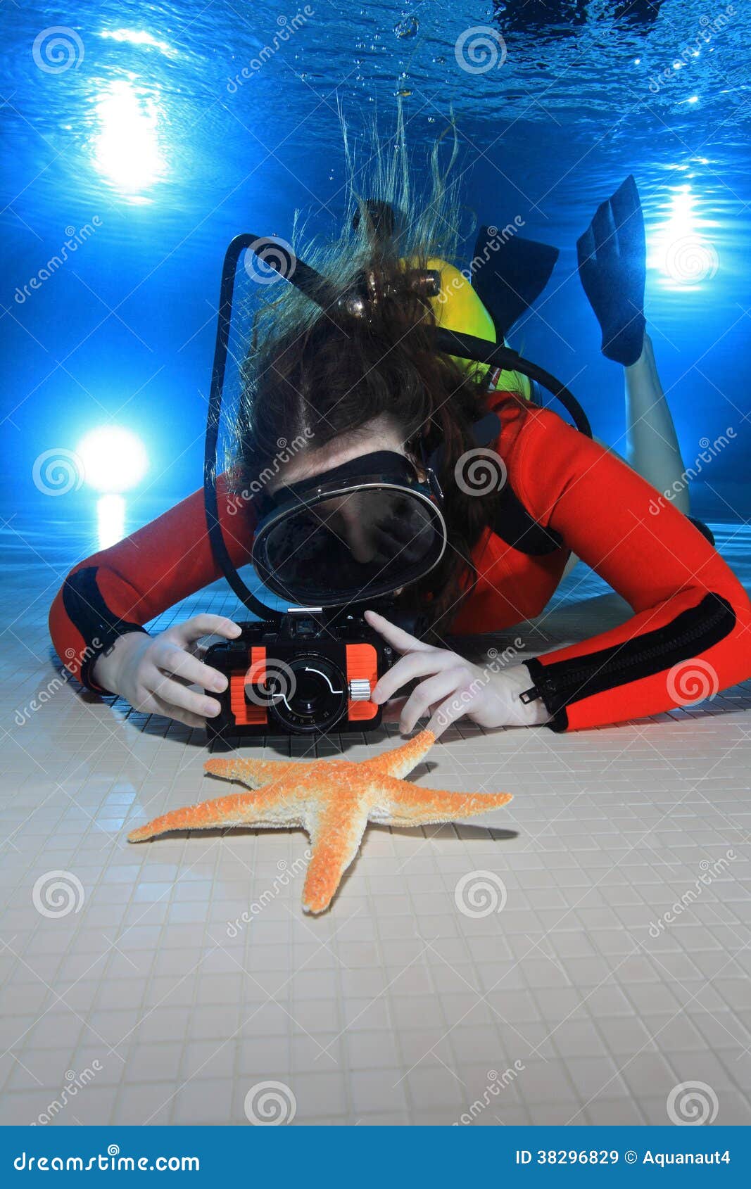 Scuba woman with camera stock image. Image of diving - 38296829