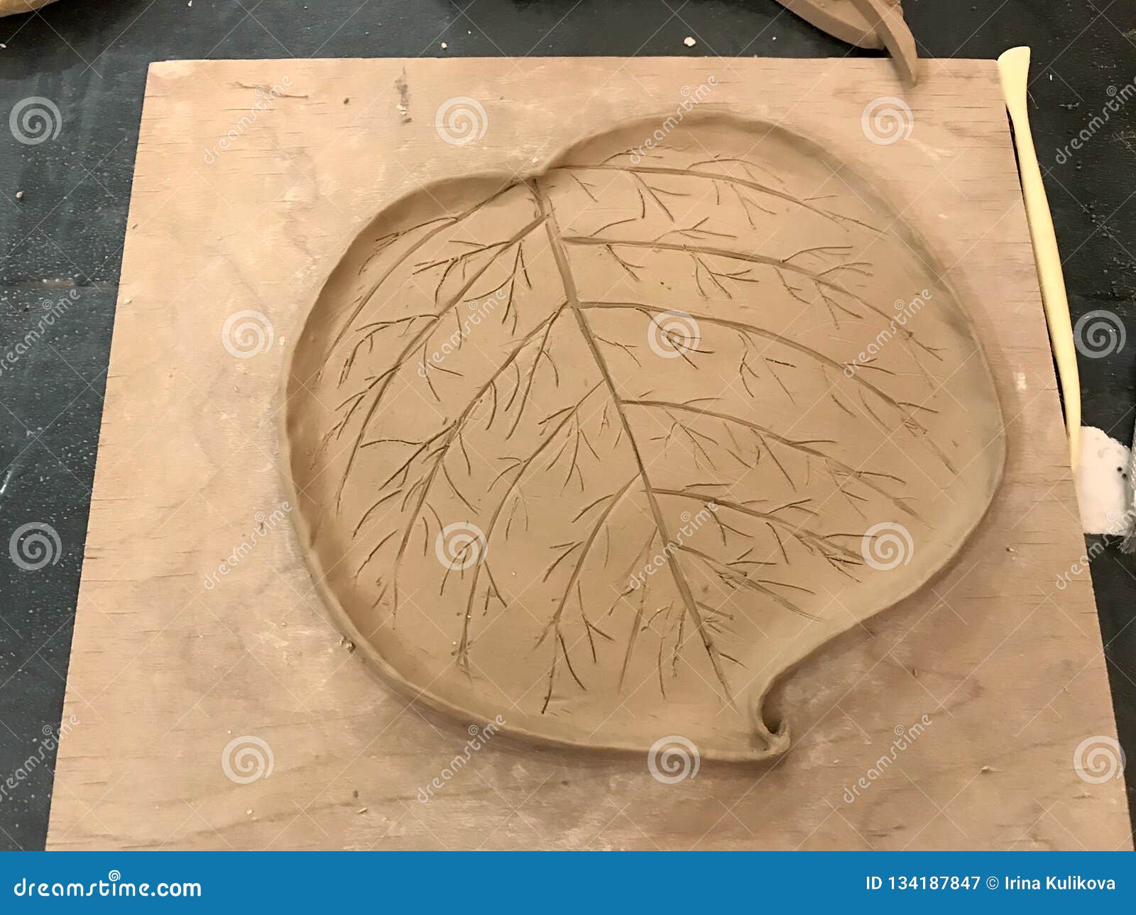 Sculpting Clay in the Process. Preparation of a Clay Flat Plate in the ...