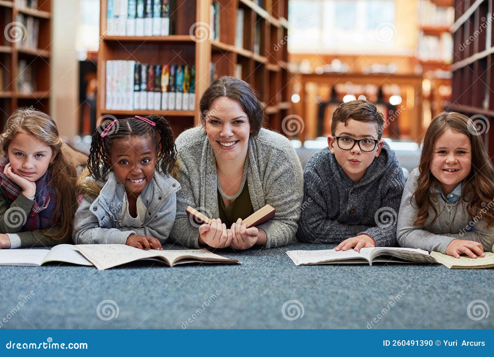 Sculpting Young Minds with Reading. Elementary School Kids Reading with ...