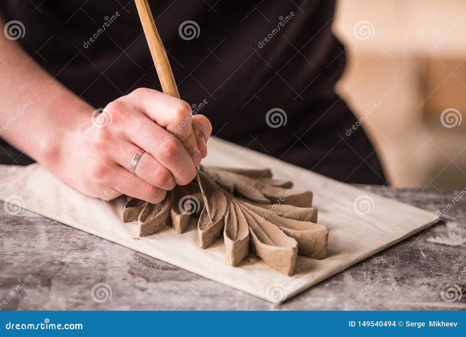 Sculptor Creates A Bust And Puts His Hands Clay On The Skeleton Of The ...