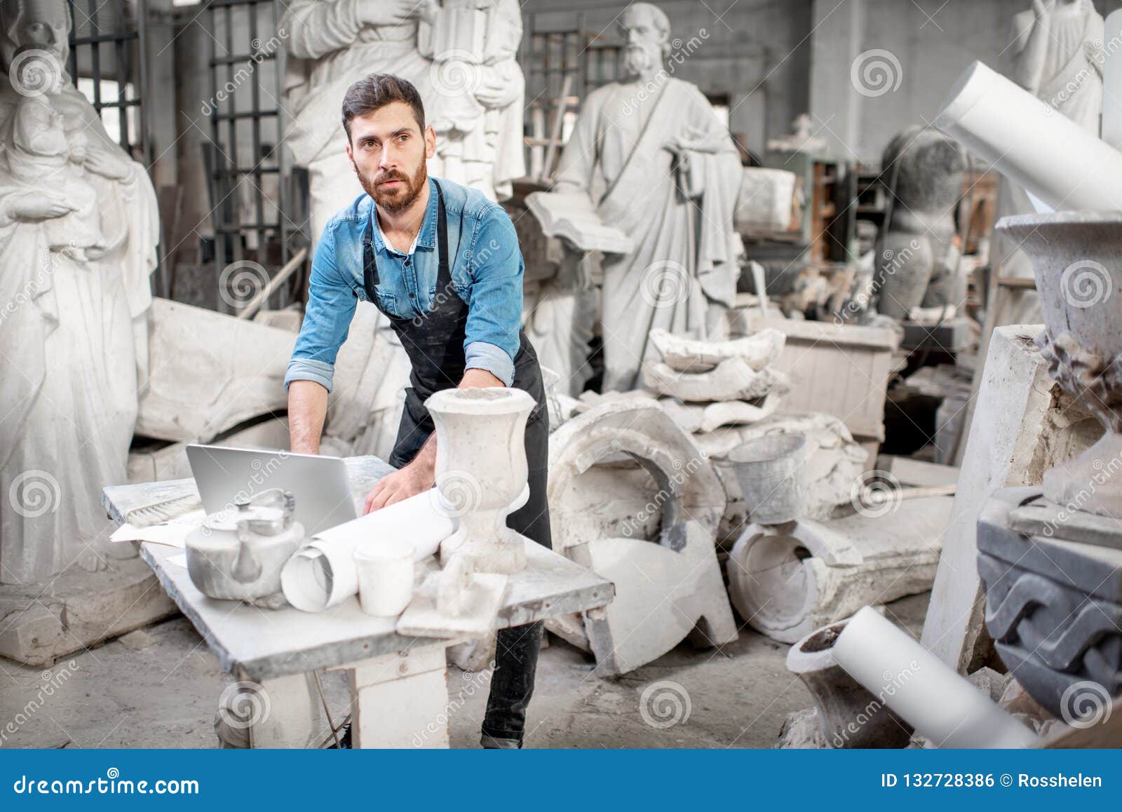 Sculptor Working with Laptop in the Studio Stock Photo - Image of ...