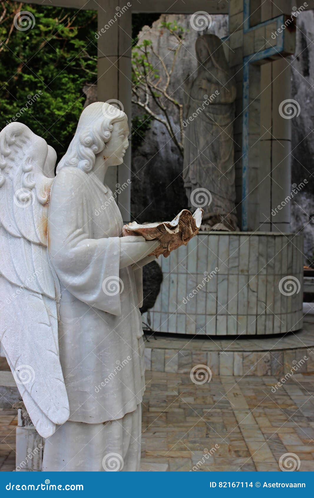 Sculpture of an Angel with a Sea Shell . Philippines Stock Photo ...