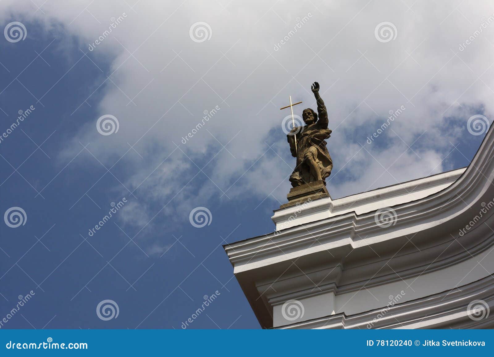 Sculpture on church ledge stock photo. Image of cross - 78120240