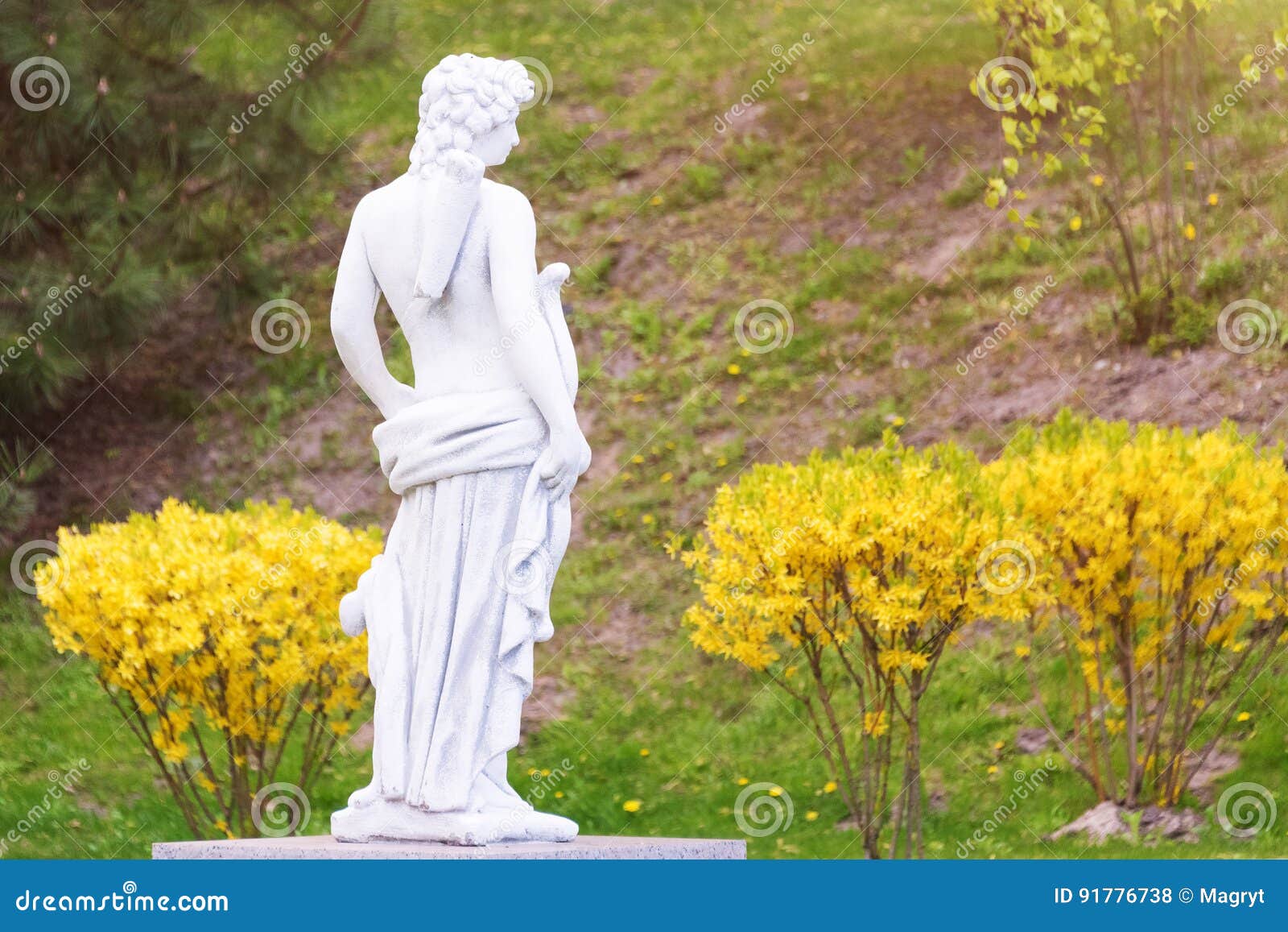 Sculpture in Classic Style. Statue of a Man Hunter with Bow in the Park ...