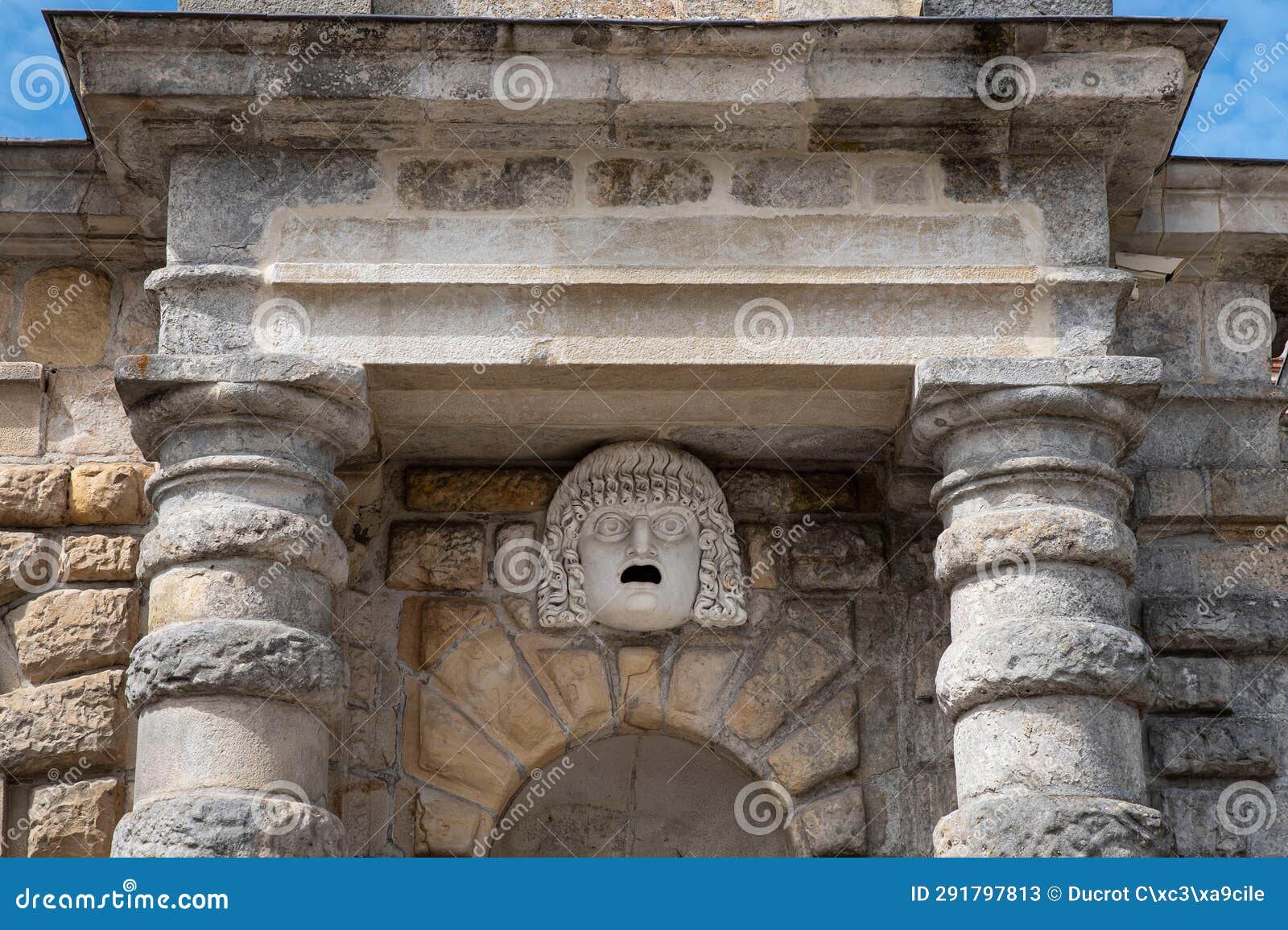 Ancient face sculpture stock image. Image of roman, building - 291797813
