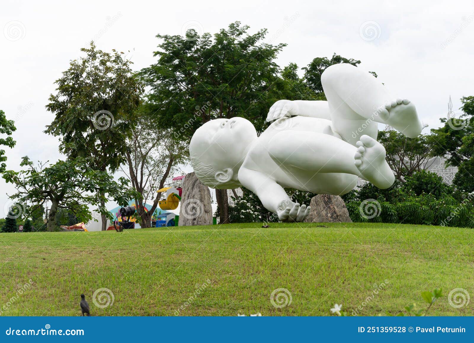 Sculpture of a giant baby stock photo. Image of travel - 251359528