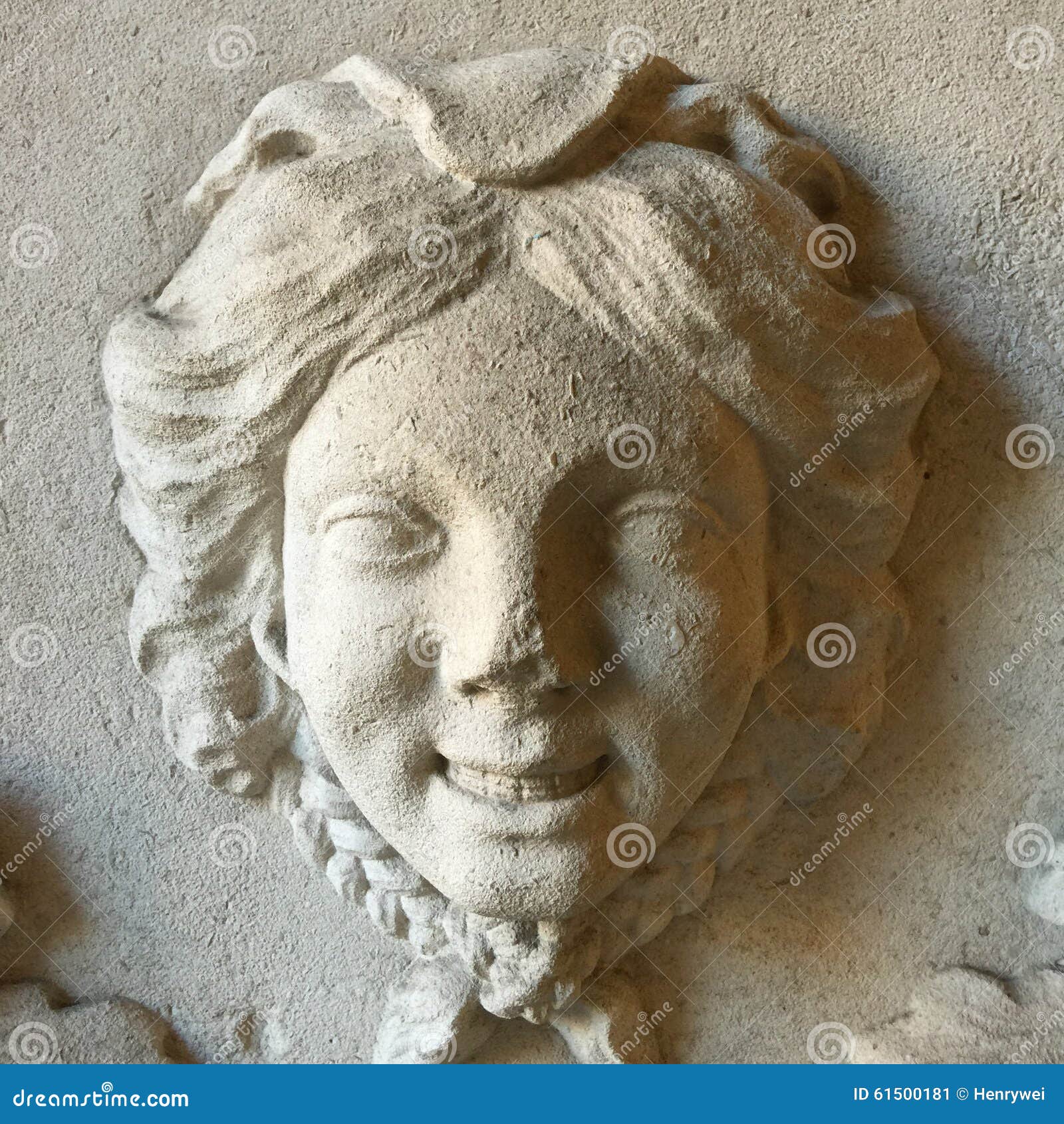Sculpture of Smile Child on the Wall Stock Image - Image of sculpture ...