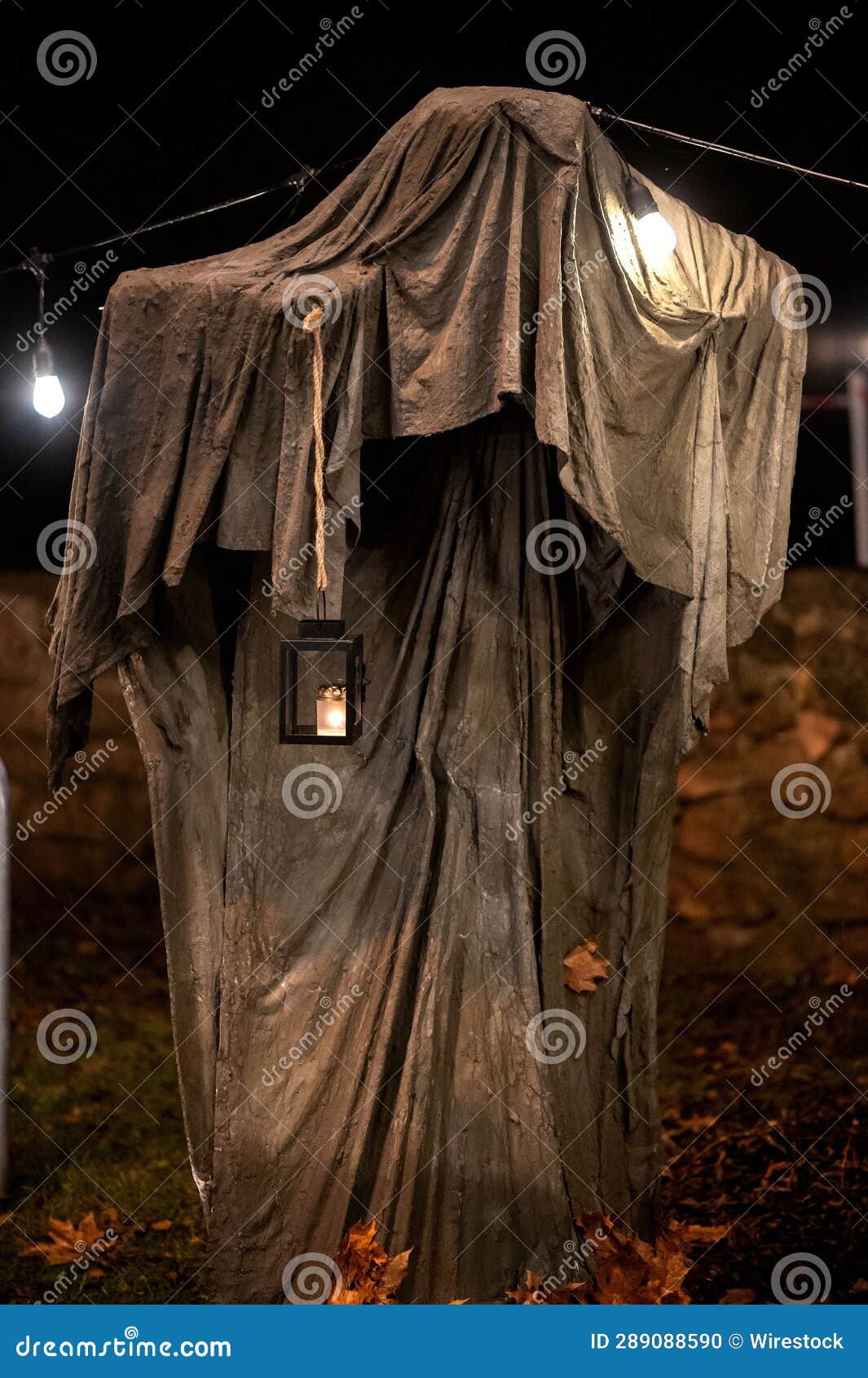 Sculpture of a Spooky Ghost Figure Suspended from a Clothesline Stock ...