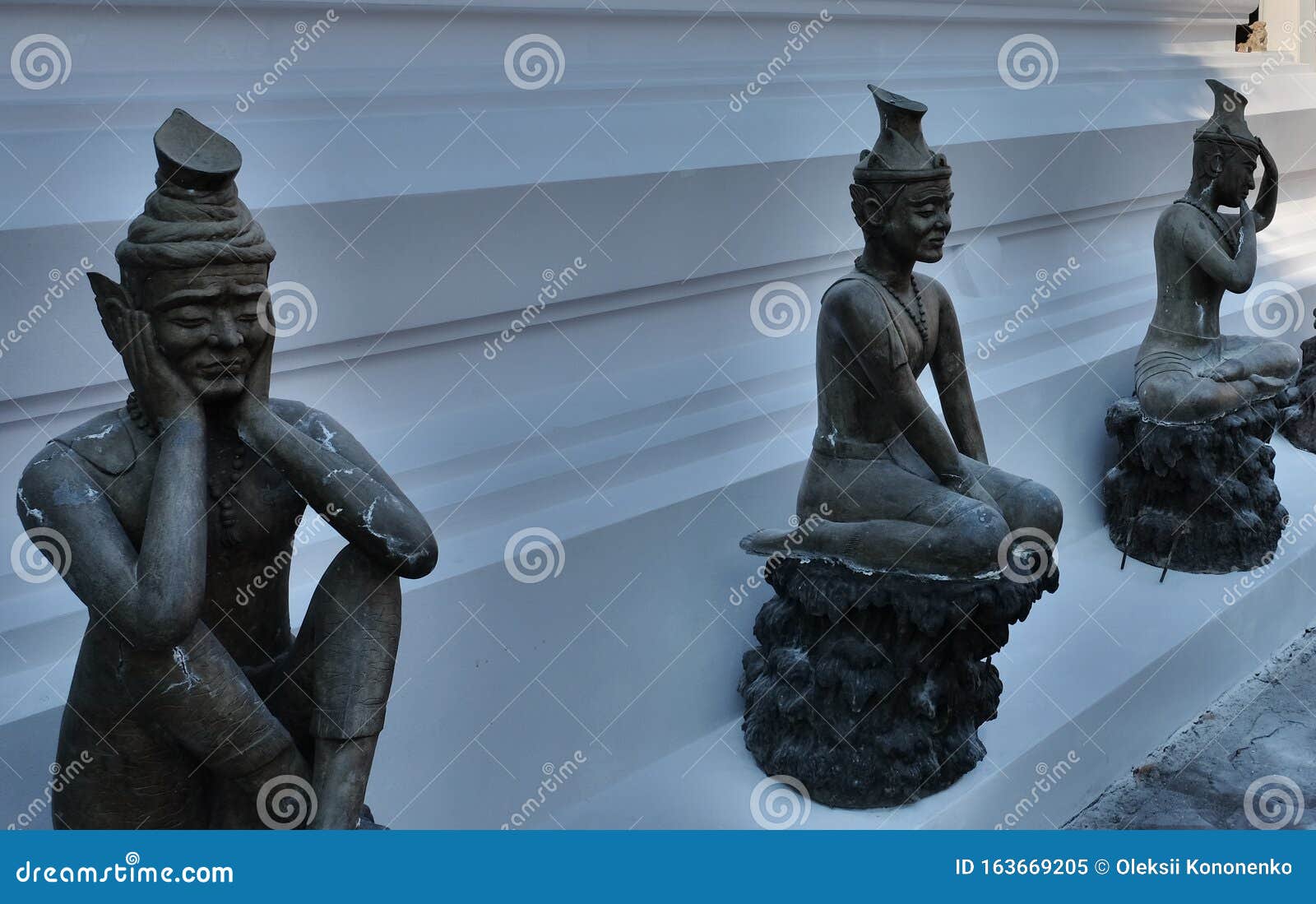 Sculptures Depicting Men in Various Poses, Placed in a Buddhist Temple ...