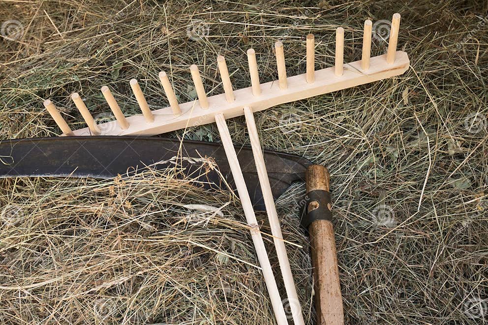 A scythe and a rake stock image. Image of grass, ancient - 123727527