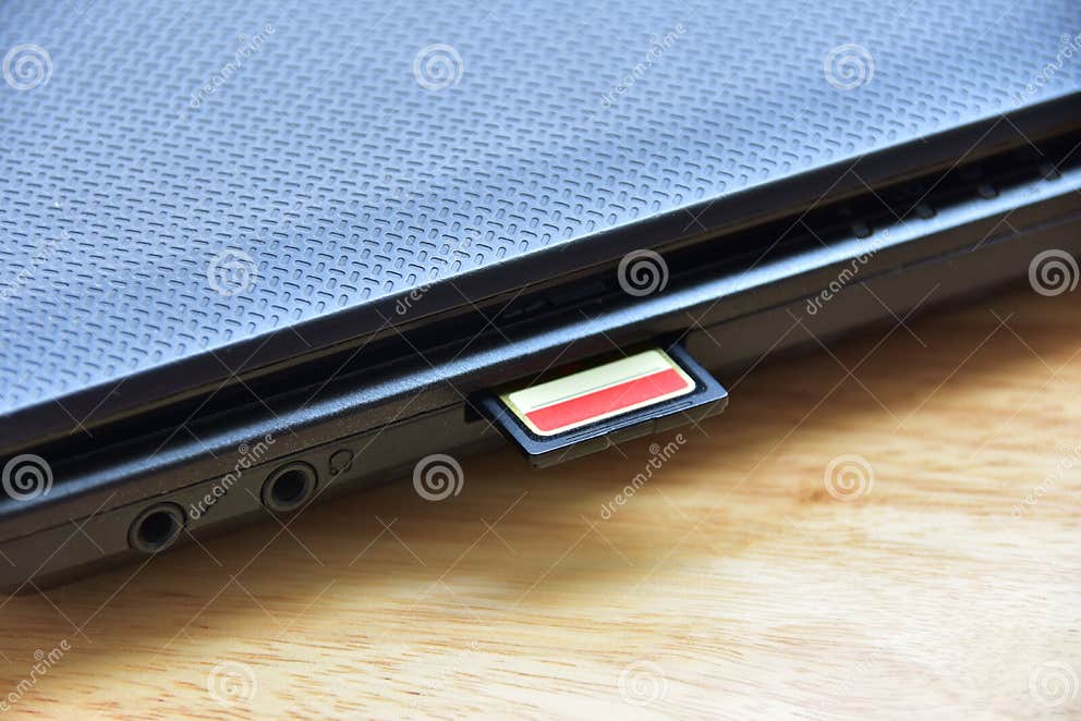 Sd Card in Slot with Computer Notebook. Stock Image - Image of memory ...