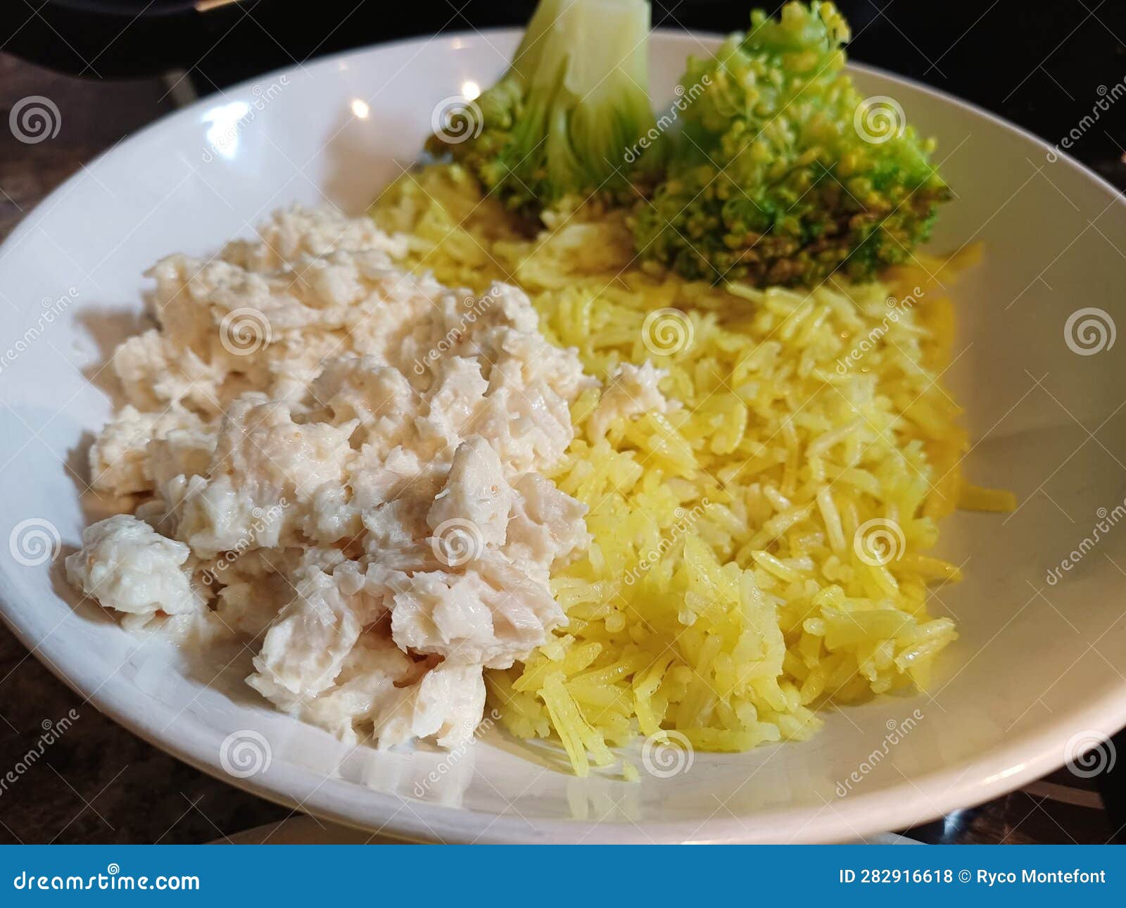 Sea Basa Fillet Pasteurized with Broccoli and Indien Yellow Rice Stock ...