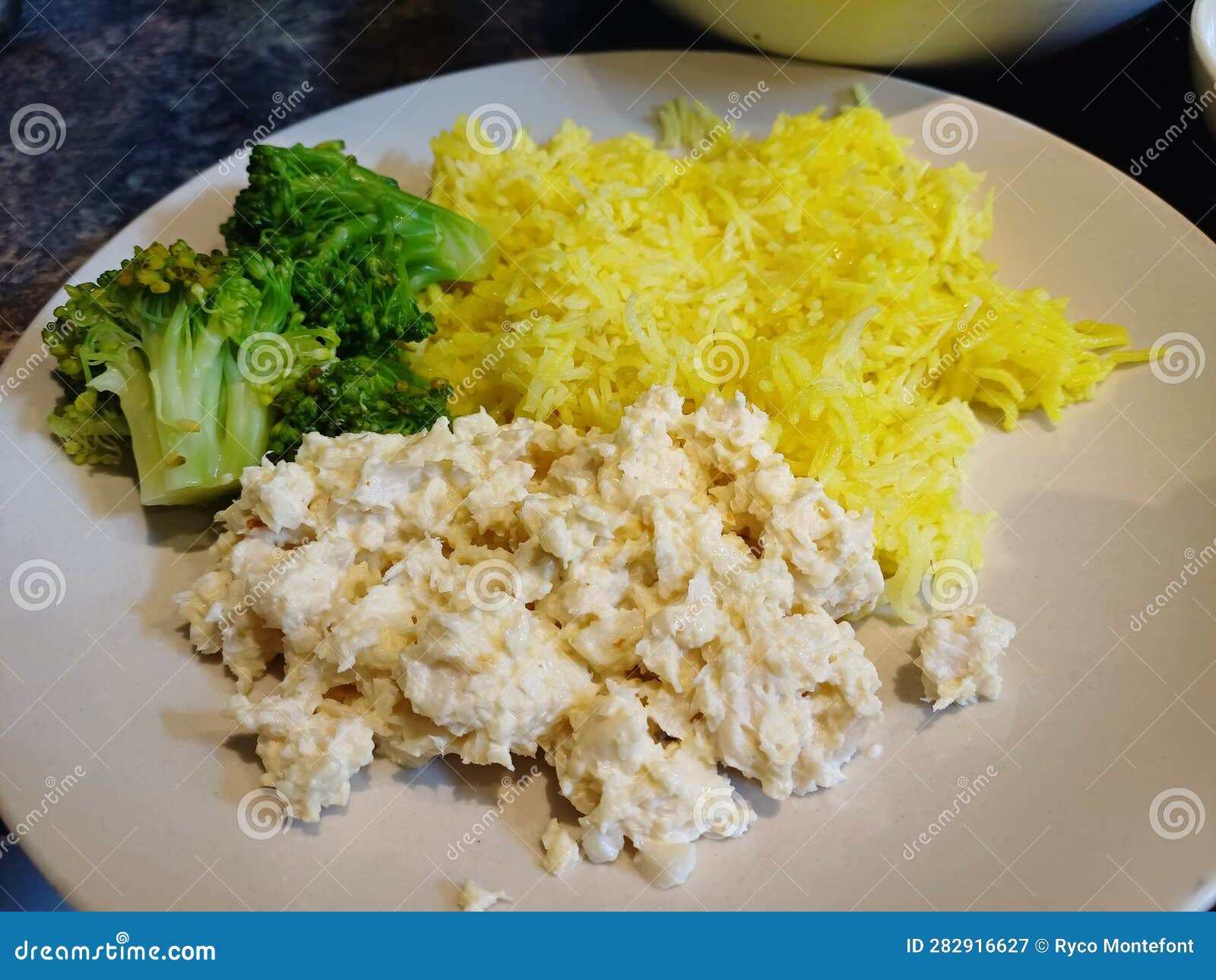 Sea Basa Fillet Pasteurized with Broccoli and Indien Yellow Rice Stock ...