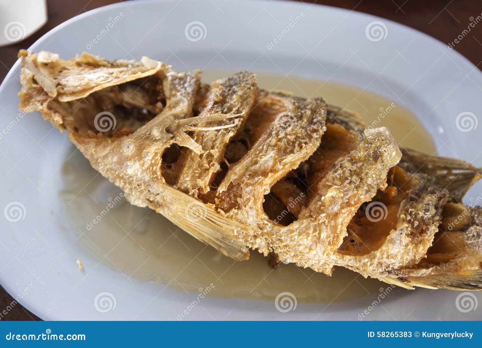Sea Bass fish deep fried stock image. Image of asia, sauce - 58265383