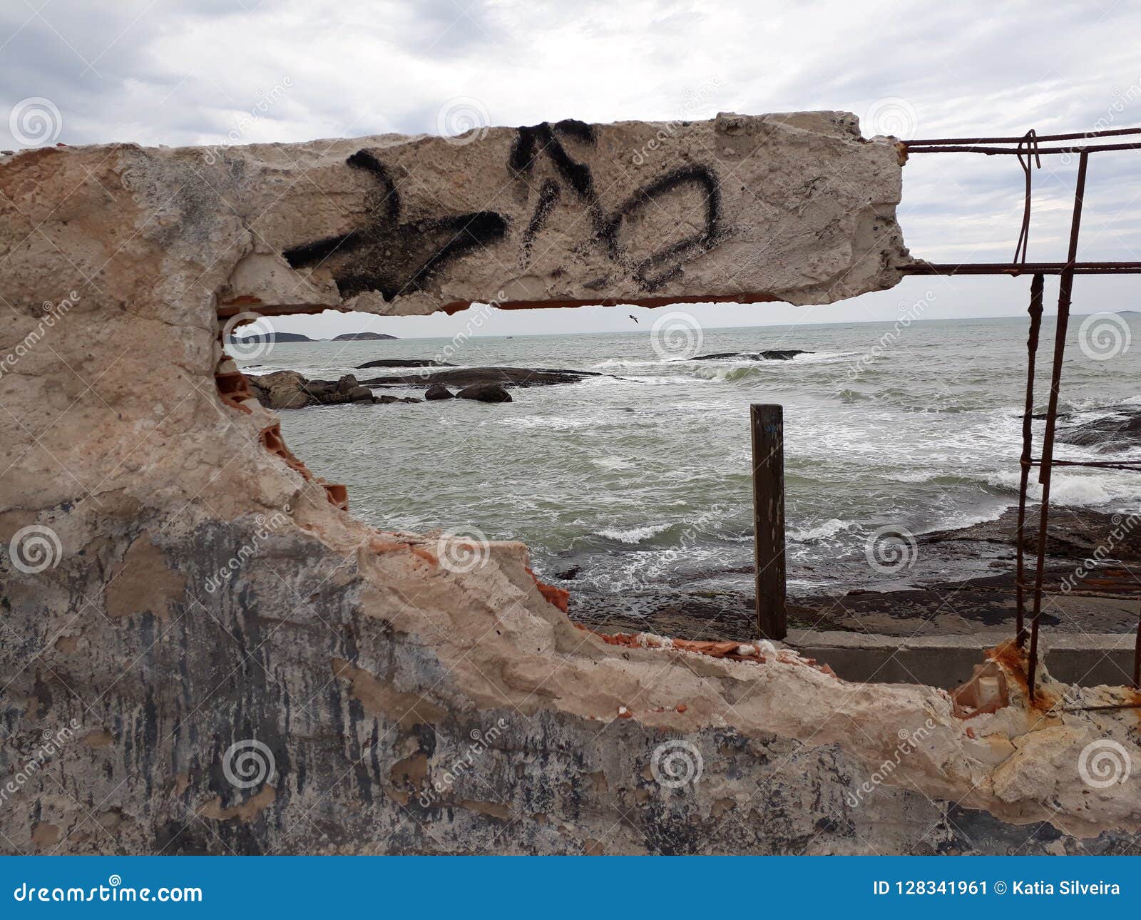 The sea behind the rubble stock image. Image of unfinished - 128341961