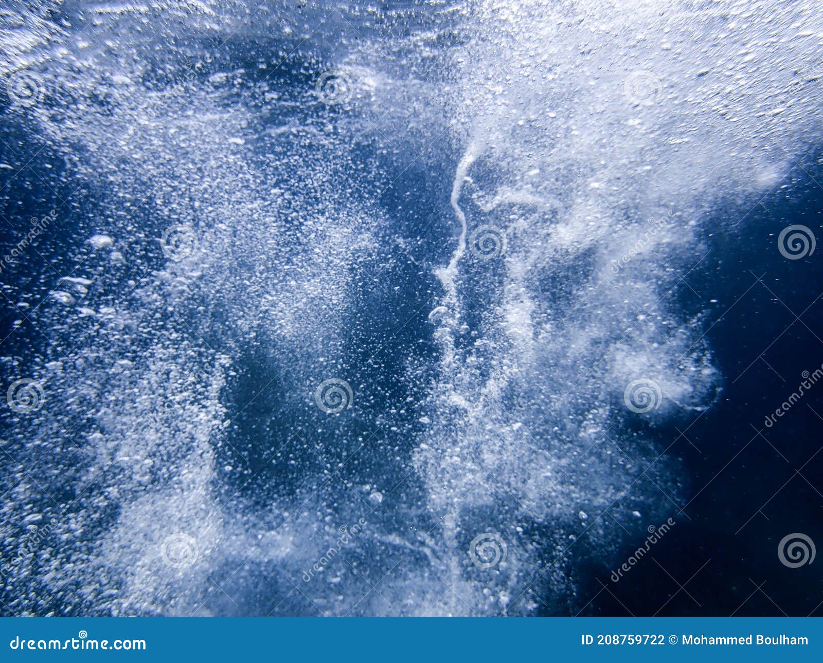 Sea Bubbles . Blue Sea Waves From Underwater With Bubbles. Light Rays ...