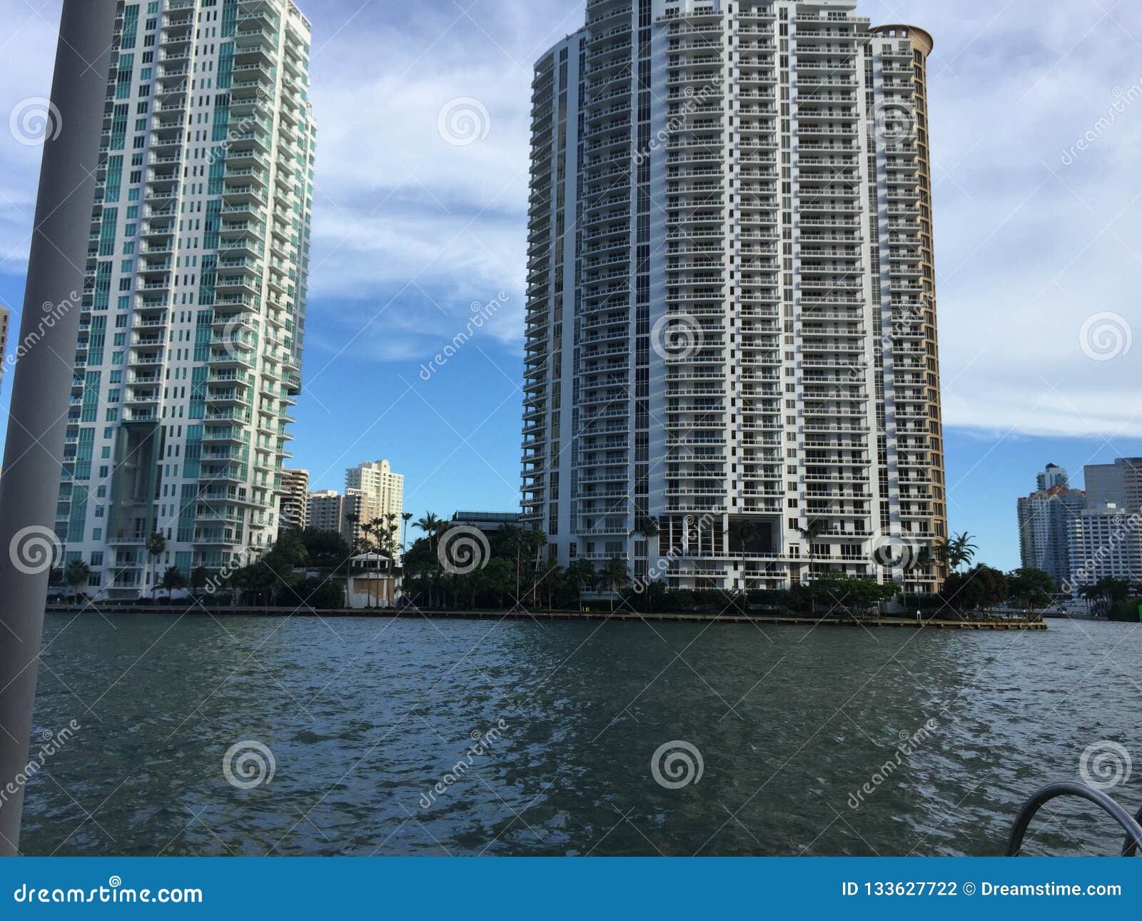 Sea stock photo. Image of city, buildings, water, cloud - 133627722