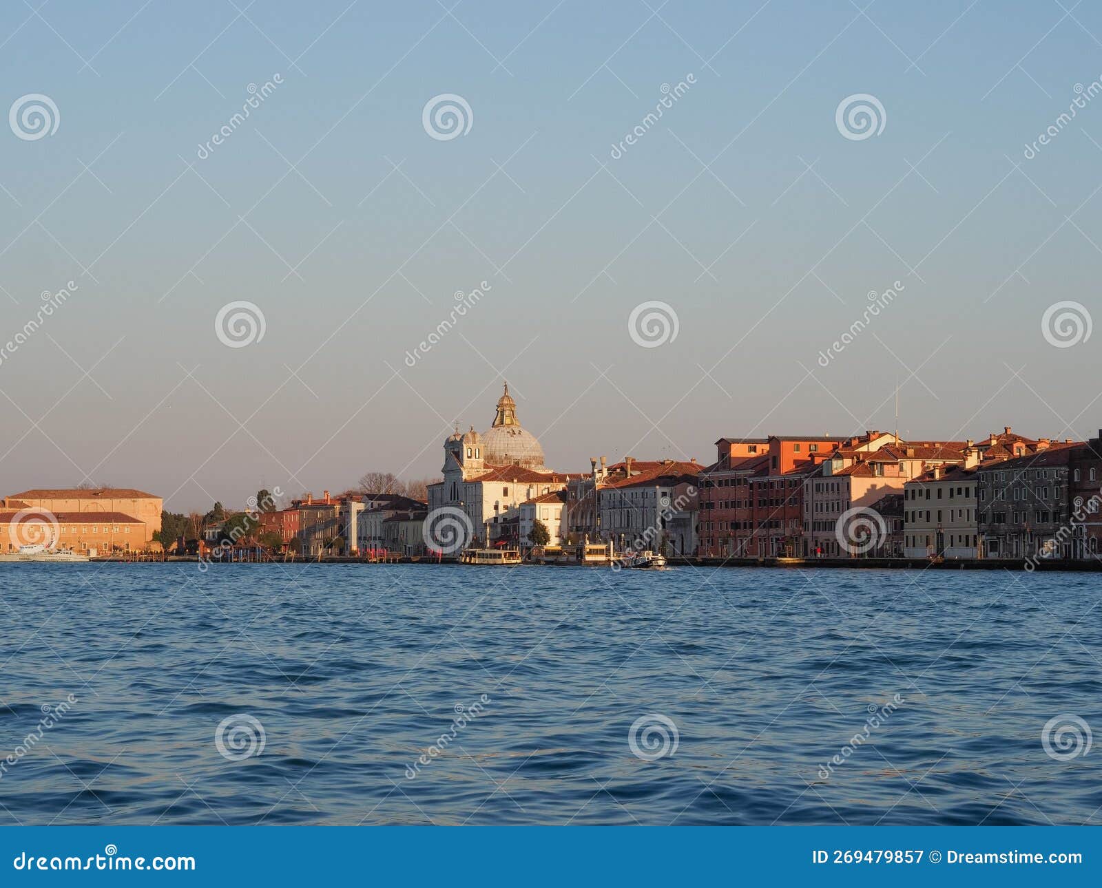 Sea and Buildings Under the Sunlight in Venice, Italy. Editorial ...