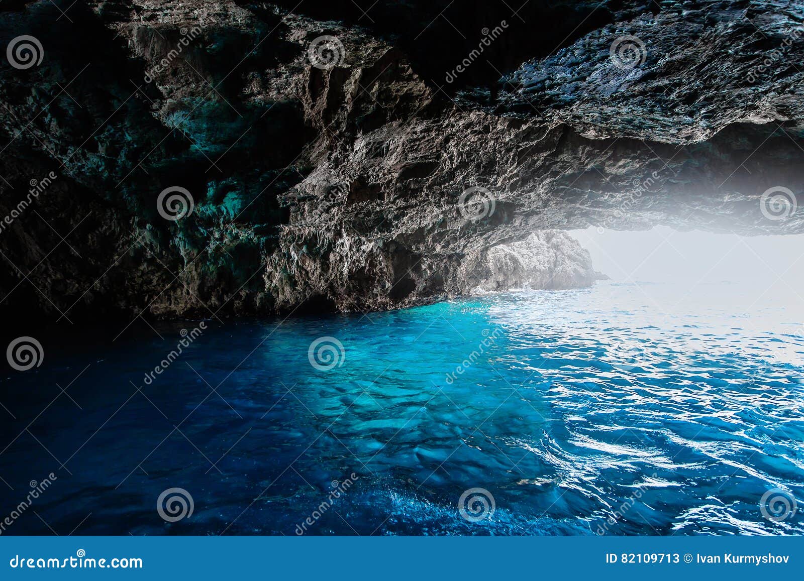 Sea cave with blue water stock image. Image of glowing - 82109713